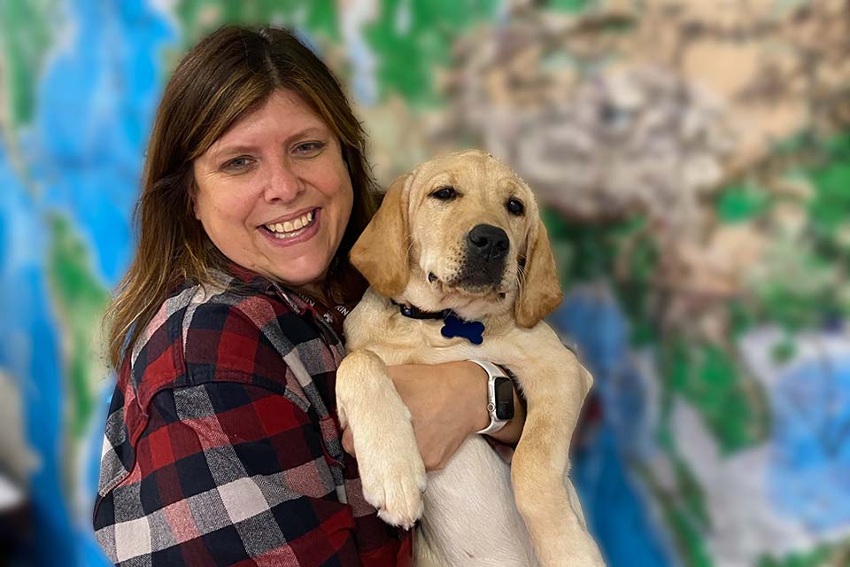 Long Island teacher spreads puppy love to whole school